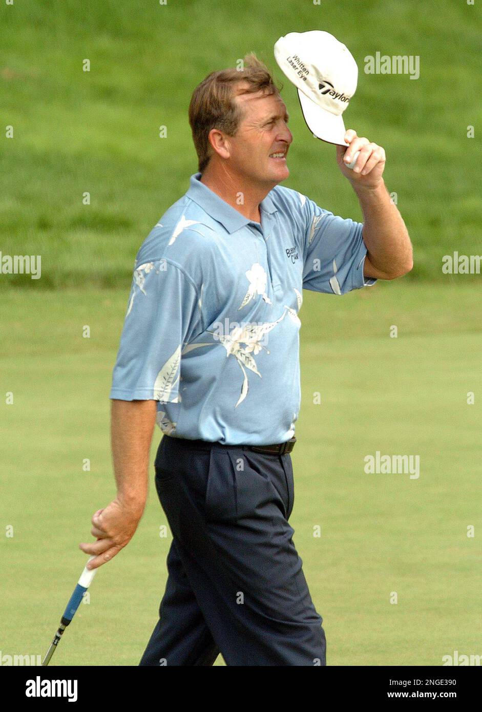 Fred Funk, from Ponte Vedra Beach, Fla., tips his hat to the crowd ...