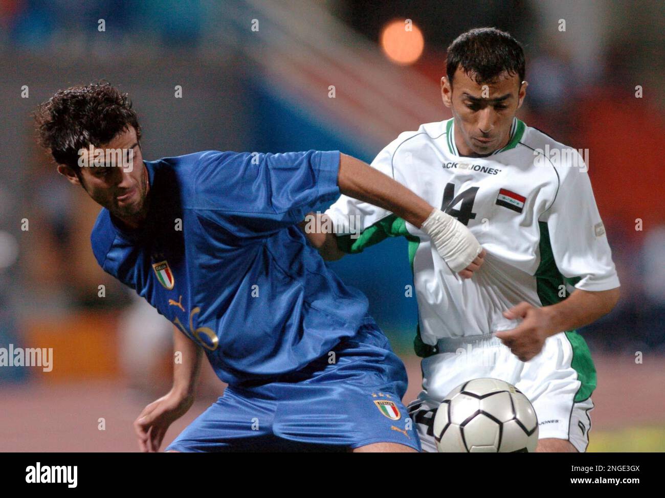 Italy's forward Simone Del Nero, left, goes for the ball against Iraq's ...