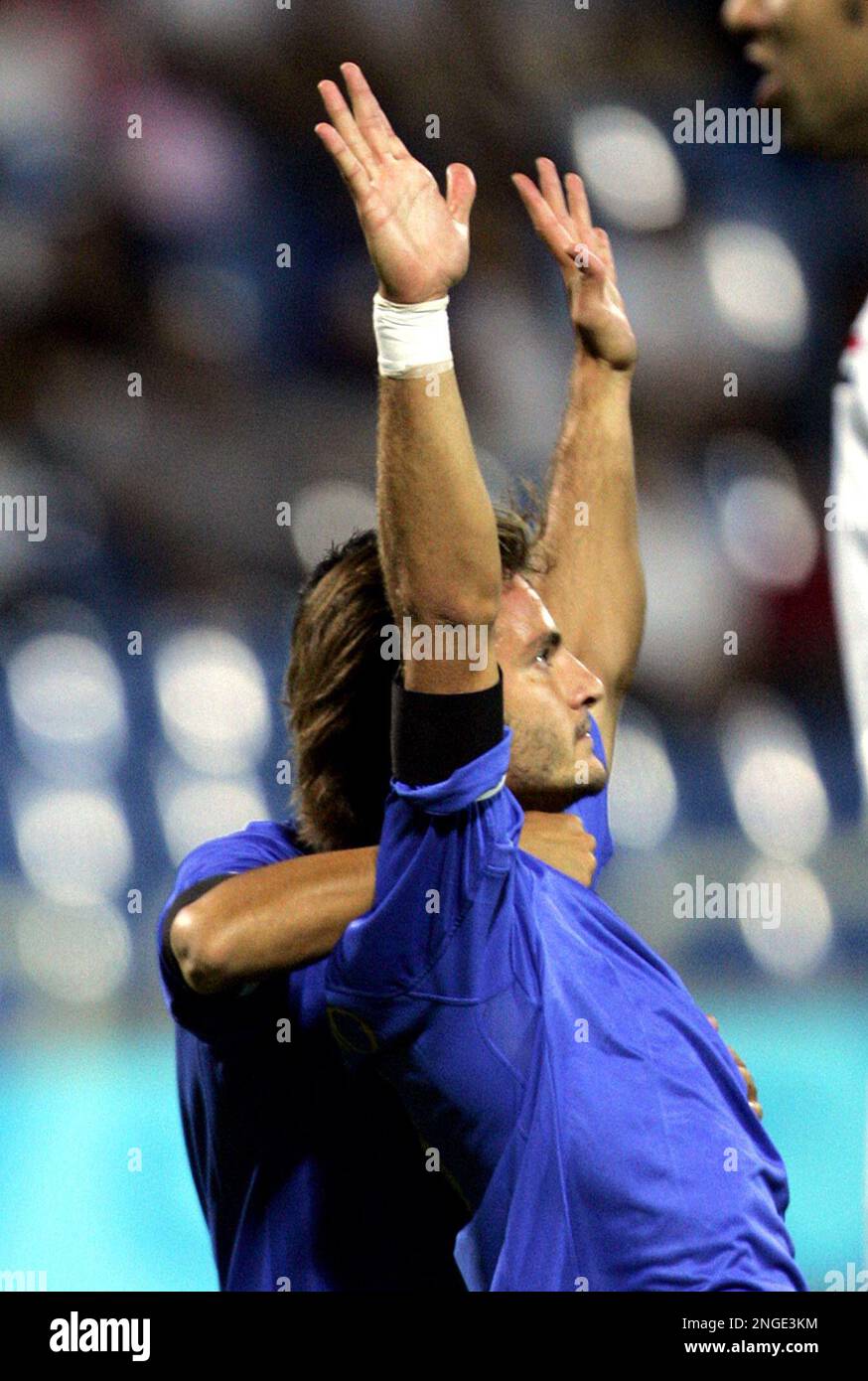 Italy's Alberto Gilardino celebrates after scoring during a bronze men ...