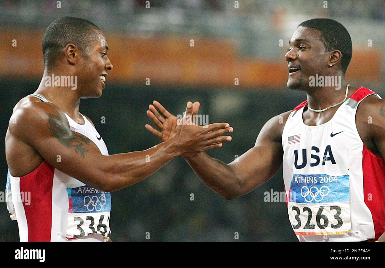 Silver medalist Bernard Williams, left, and bronze medalist Justin ...