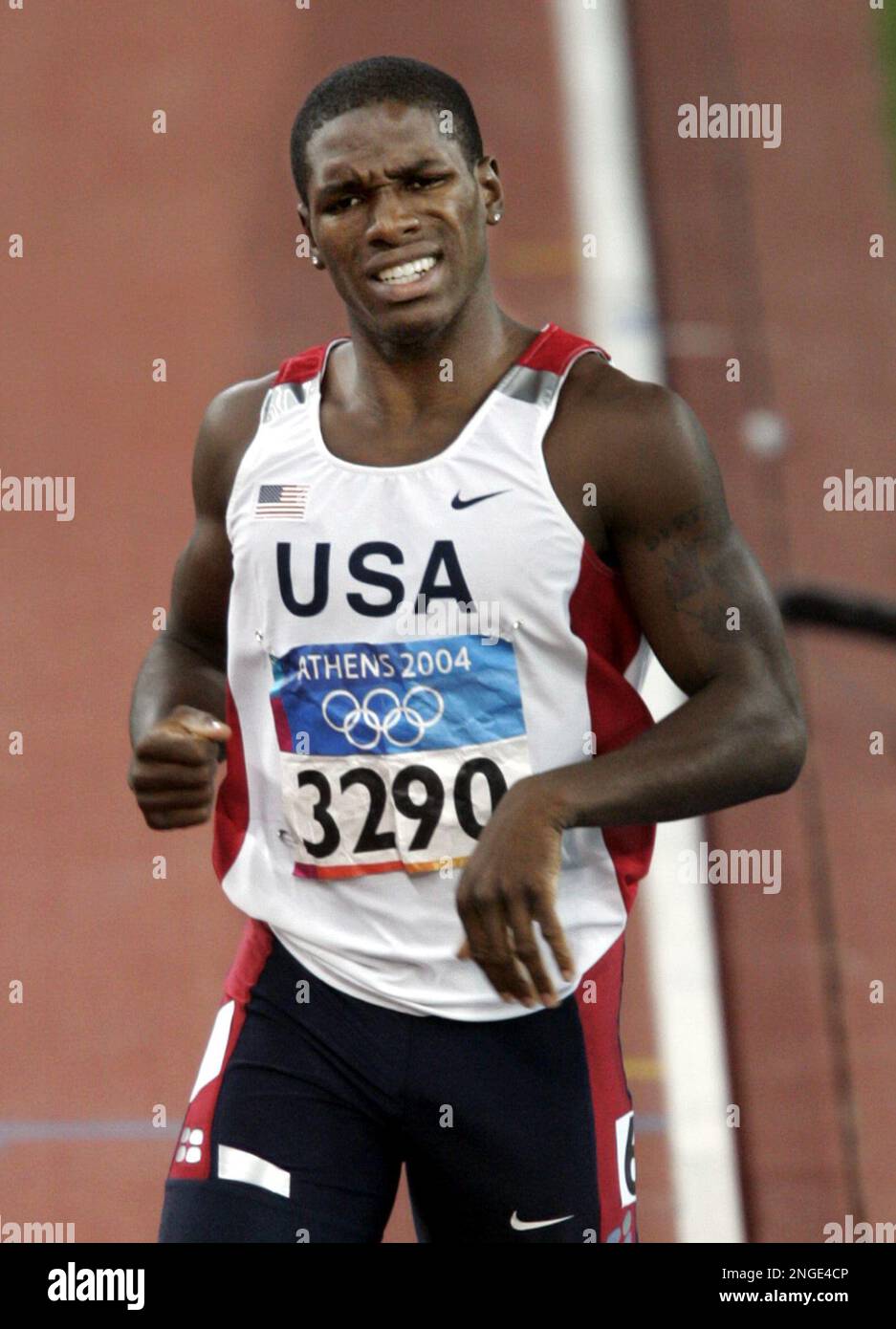 Jonathan Johnson, of the United States, reacts after failing to qualify ...
