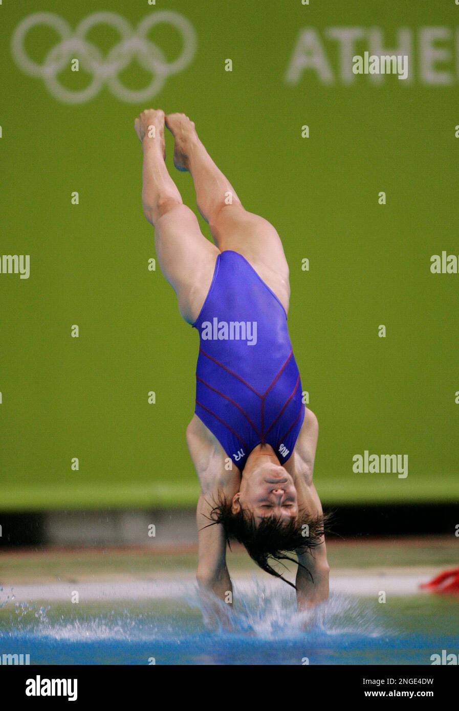 Russia's Vera Ilyina enters the pool on her first dive in the finals of ...