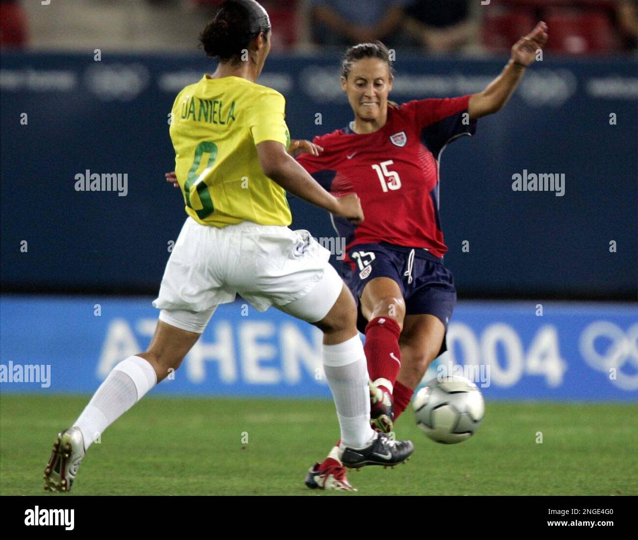 USA's Kate Markgraf, right, goes for the ball against Brazil's Daniela ...