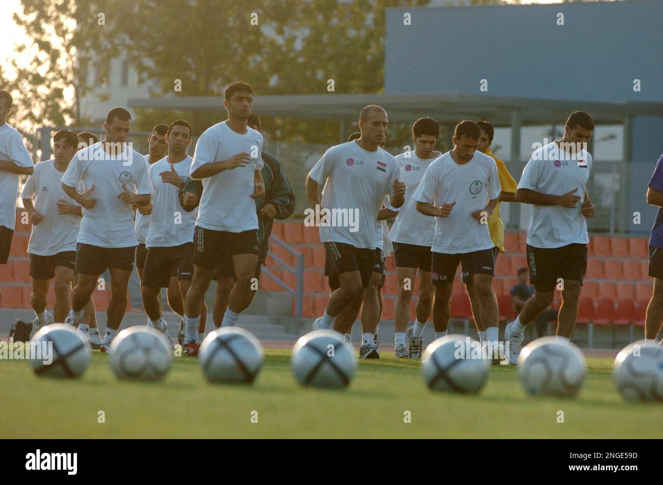 Members of the Iraqi Olympic soccer team practice in Toumba Stadium, in ...