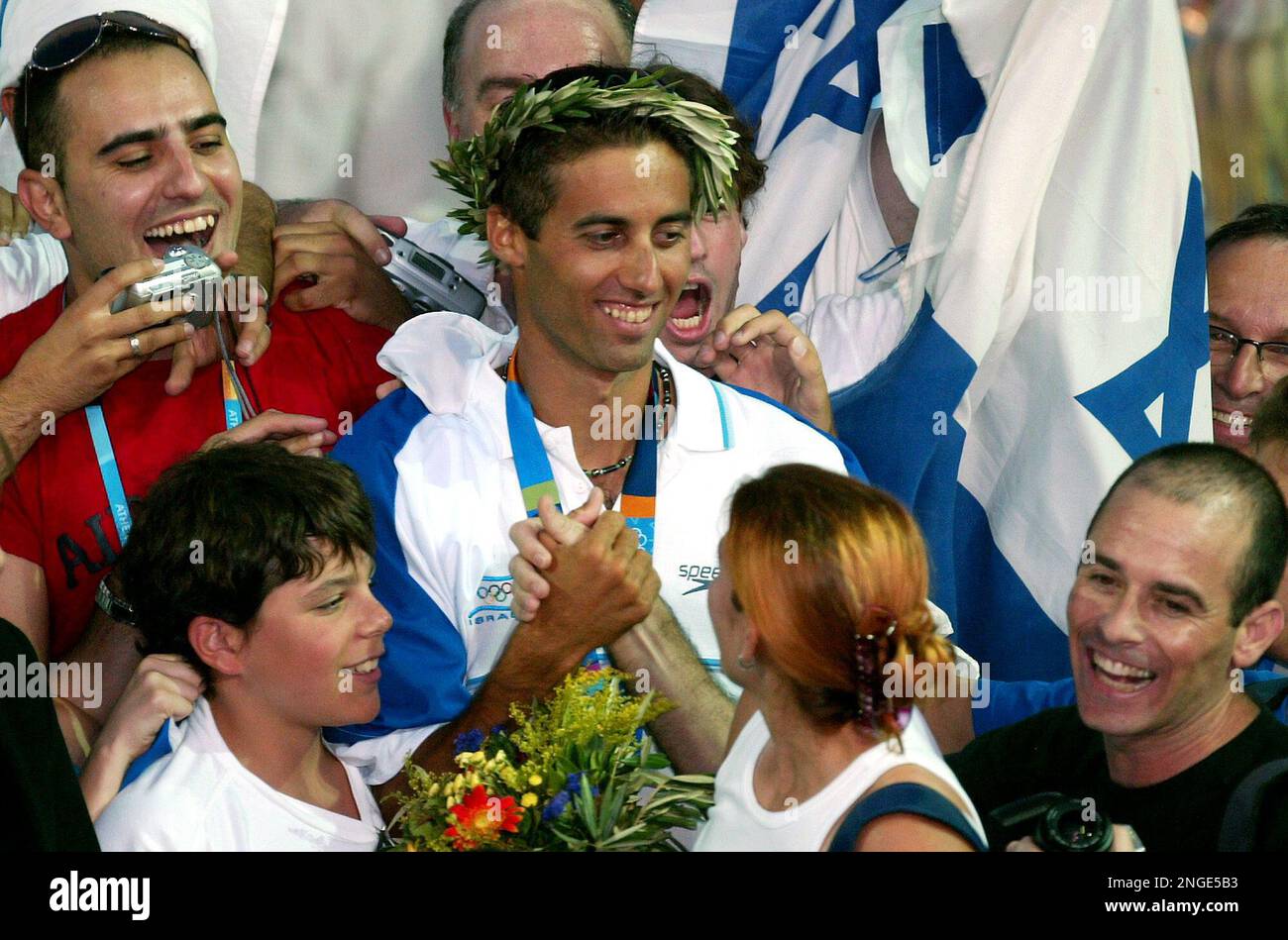 Israel`s gold medalist Gal Fridman is surrounded by spectators during ...