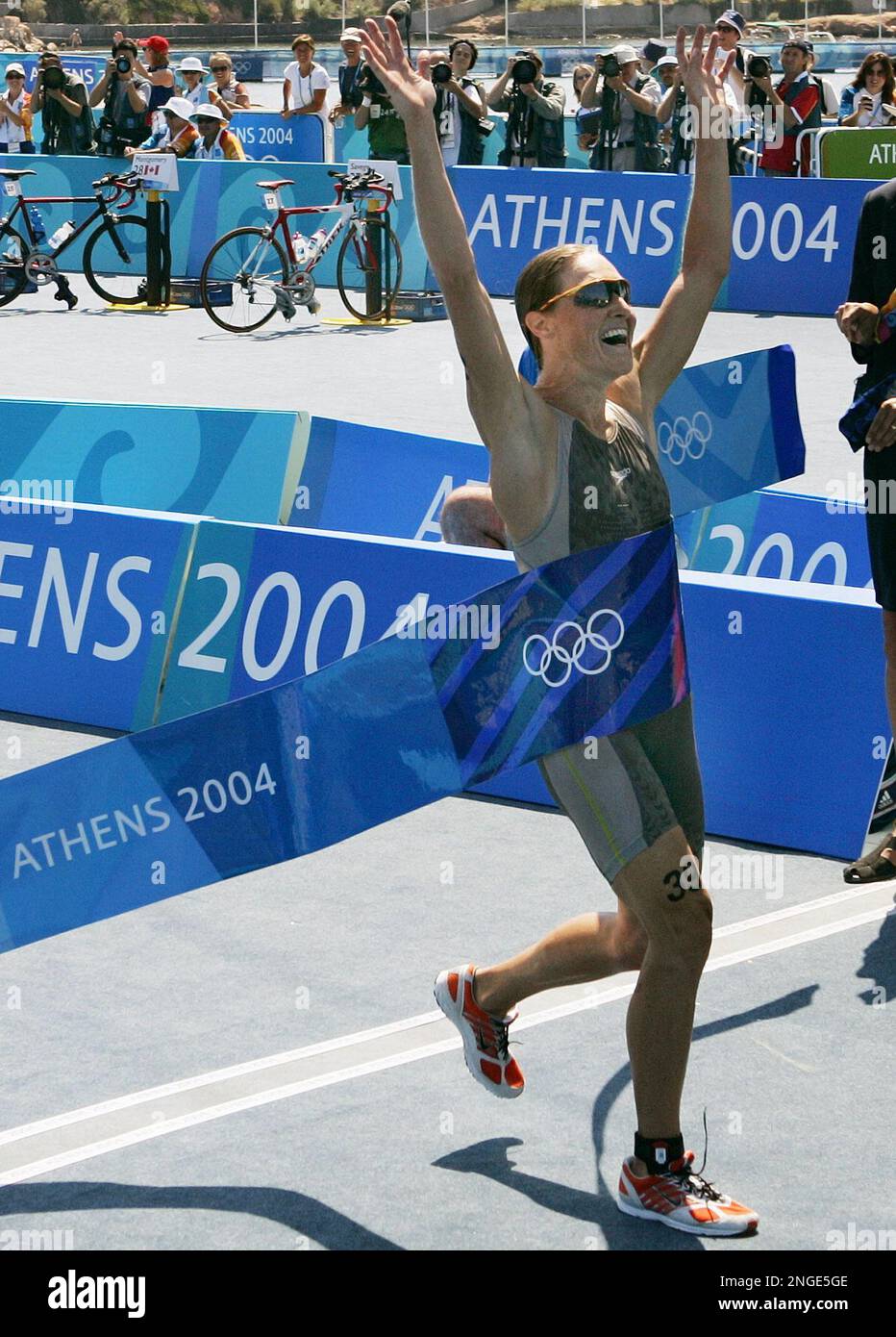 Kate Allen, of Austria, reacts as she crosses the finish line to win ...