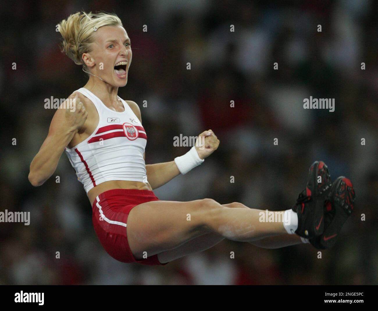 Poland's Anna Rogowska reacts on her way to winning the bronze medal in ...