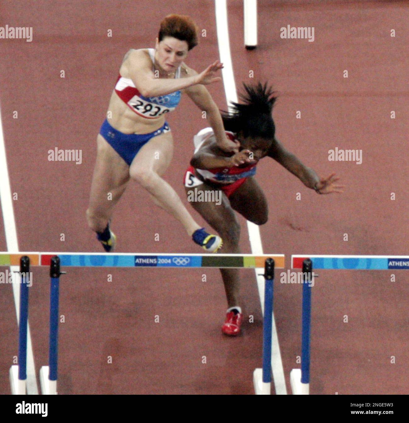 Canada's Perdita Felicien, right, stumbles into Russia's Irina ...