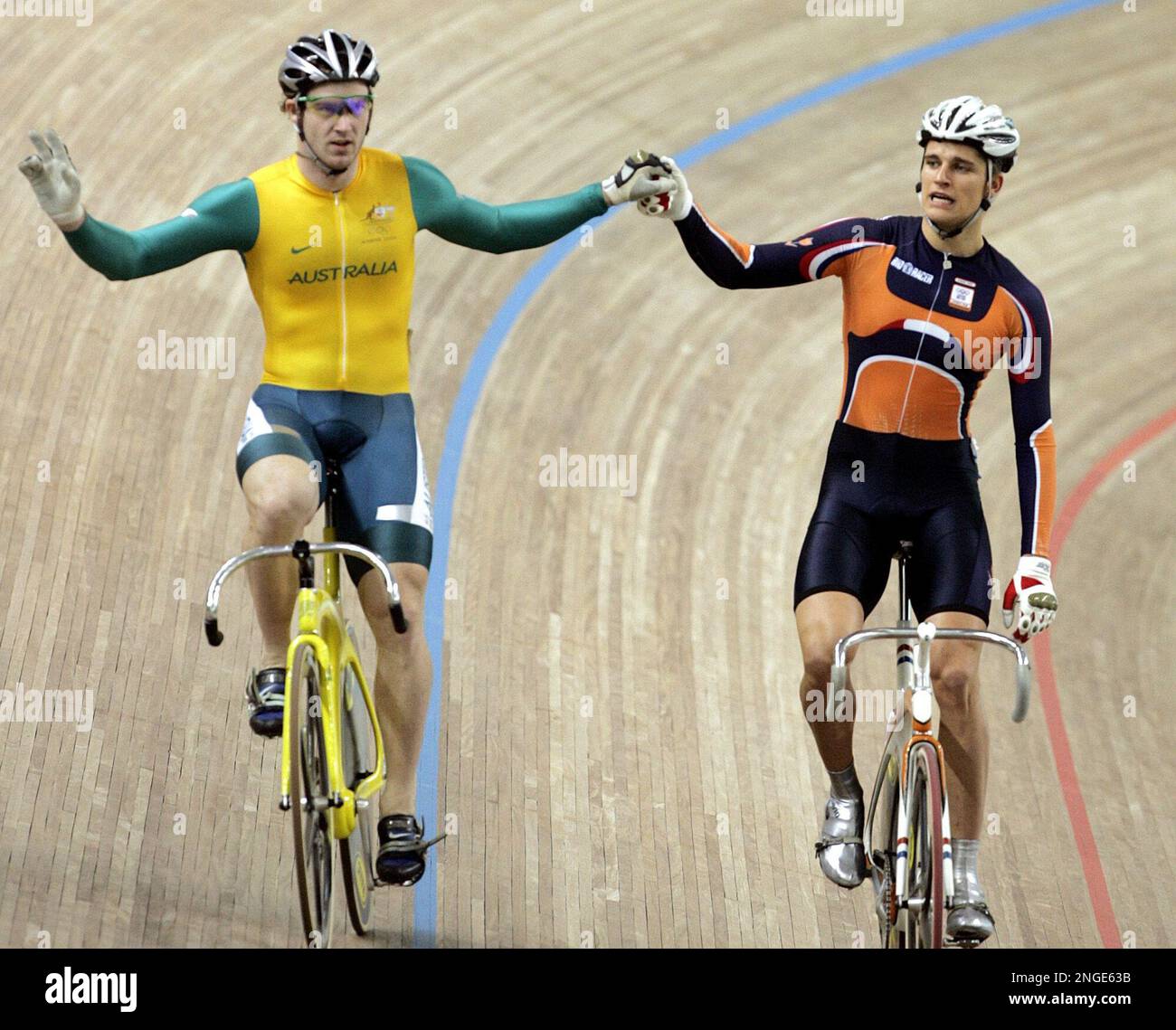 Australia's Ryan Bayley celebrates as he beats Theo Bos of the ...