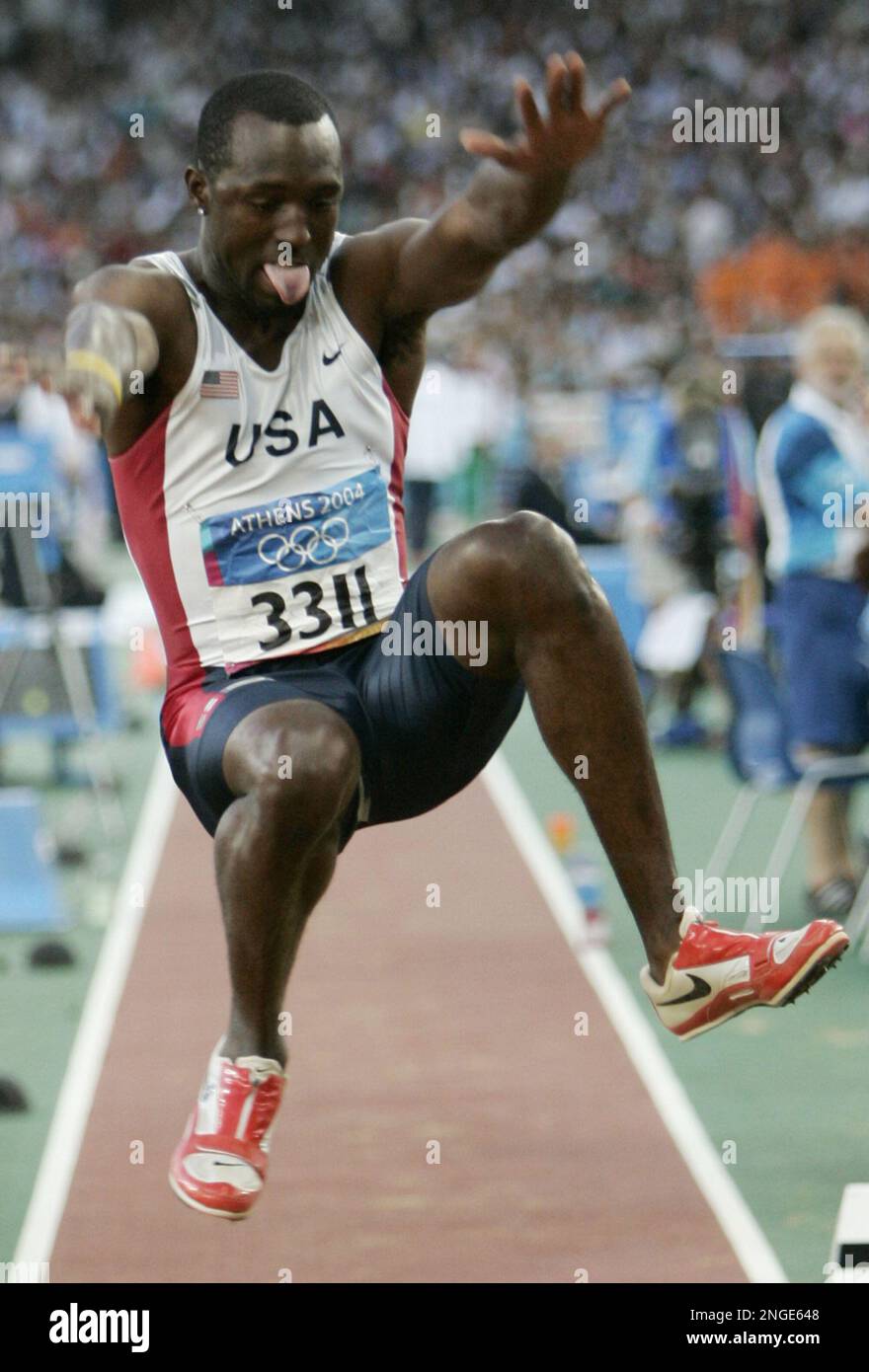 John Moffitt of the US competes in the men's long jump at the 2004 ...