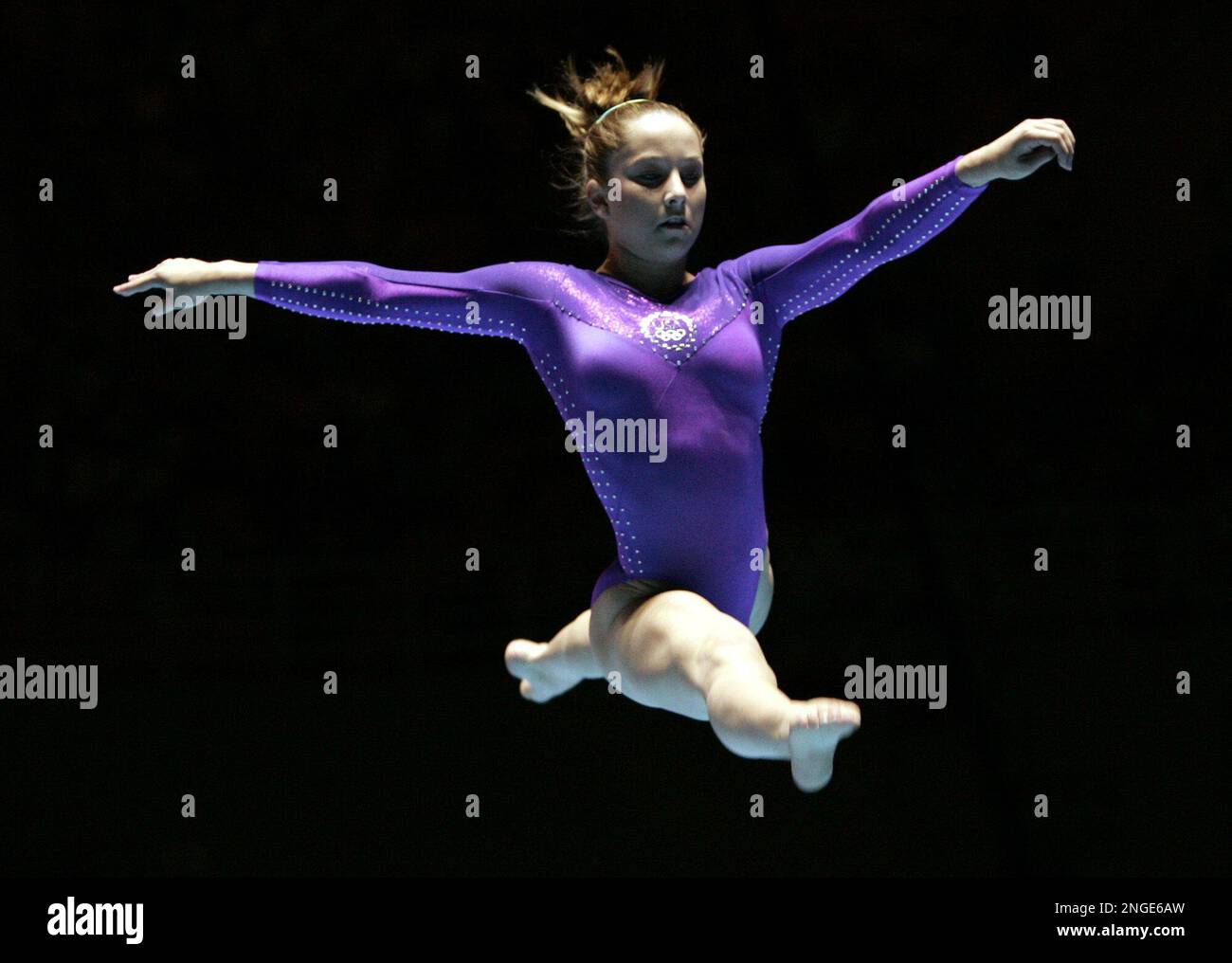Gold-medalist Carly Patterson of the United States performs on the ...