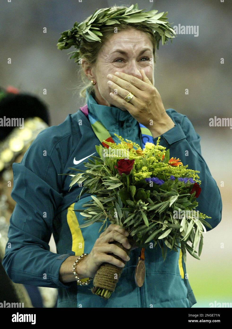 Australia's Jane Saville weeps after receiving her bronze medal for the ...