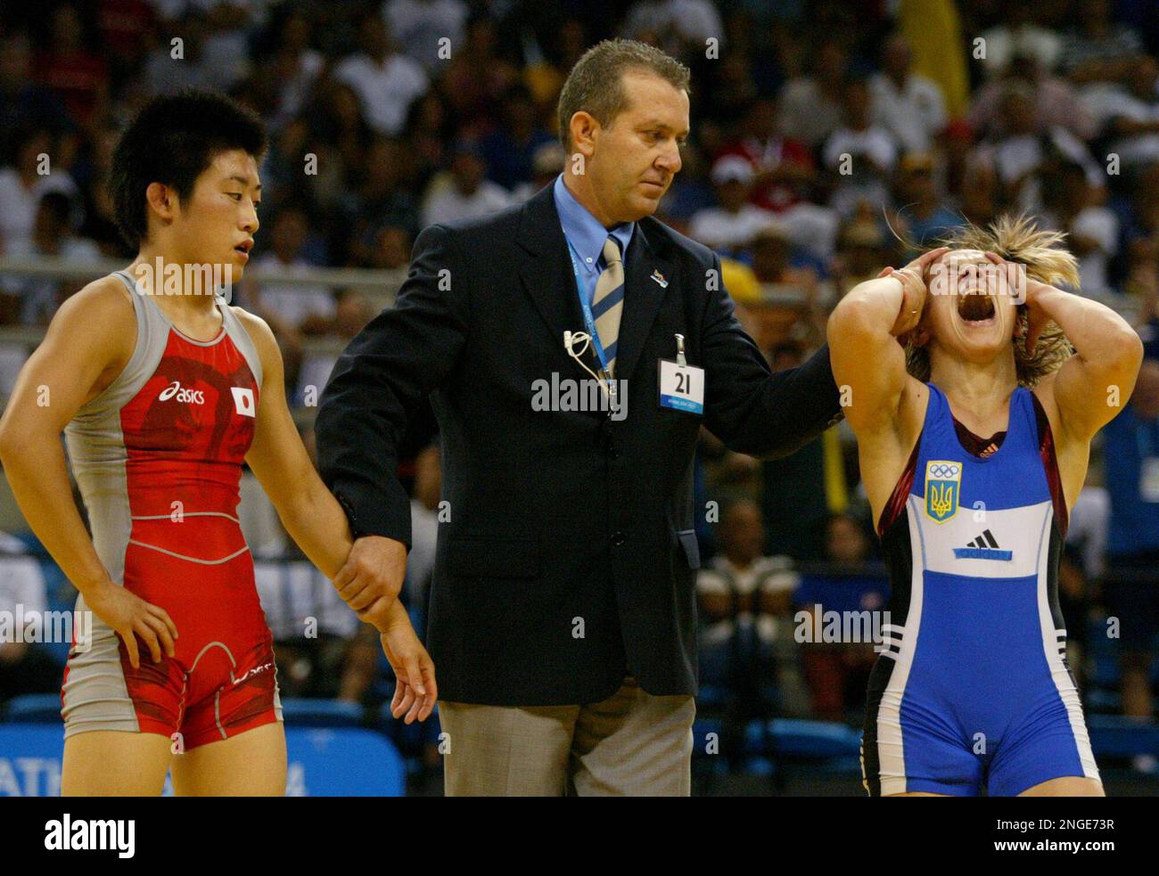 Irini Merleni, from Ukraine, right, jubilates after defeating Chiharu ...
