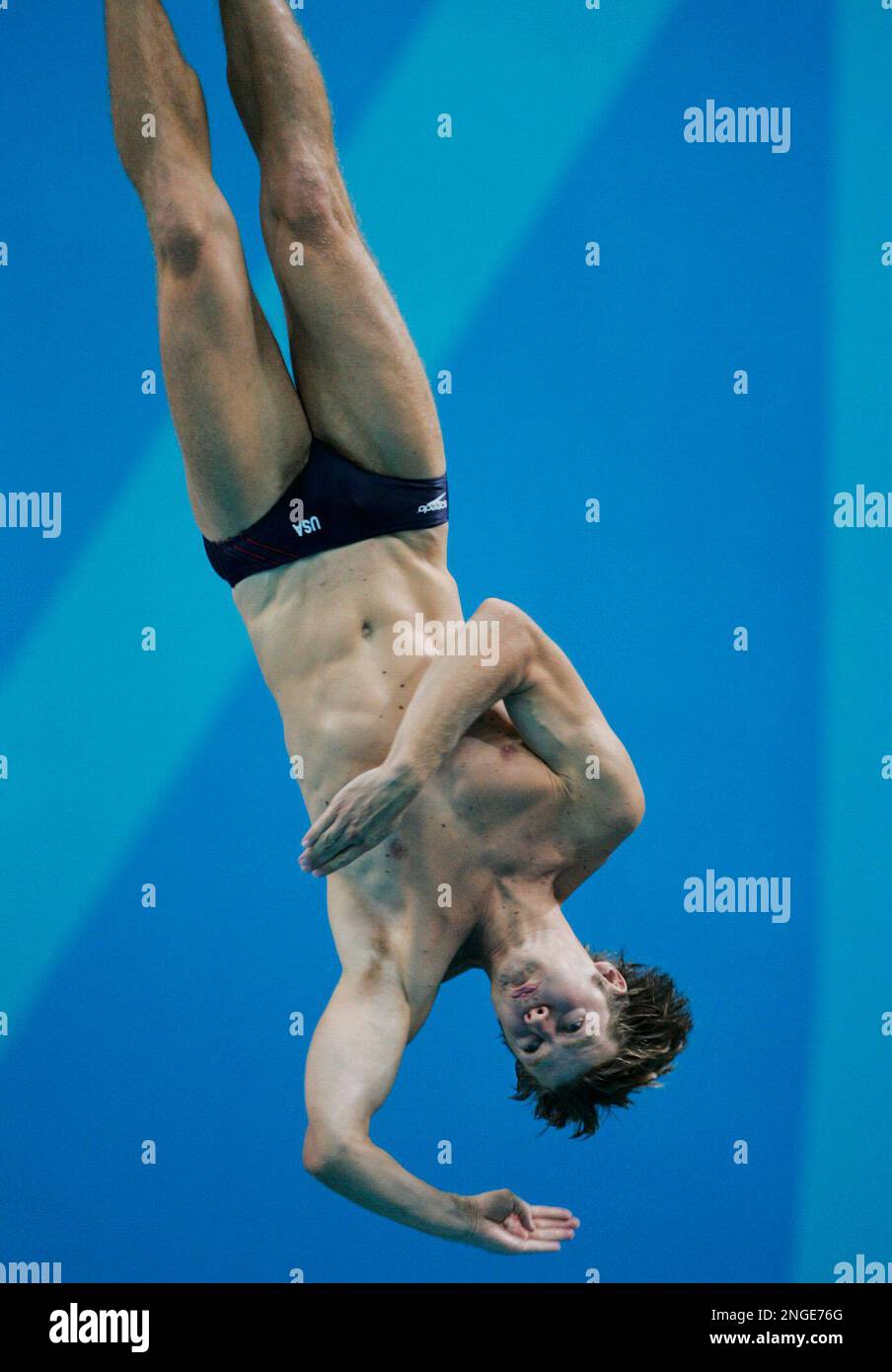USA's Justin Wilcock makes his fifth dive in the preliminaries of the ...