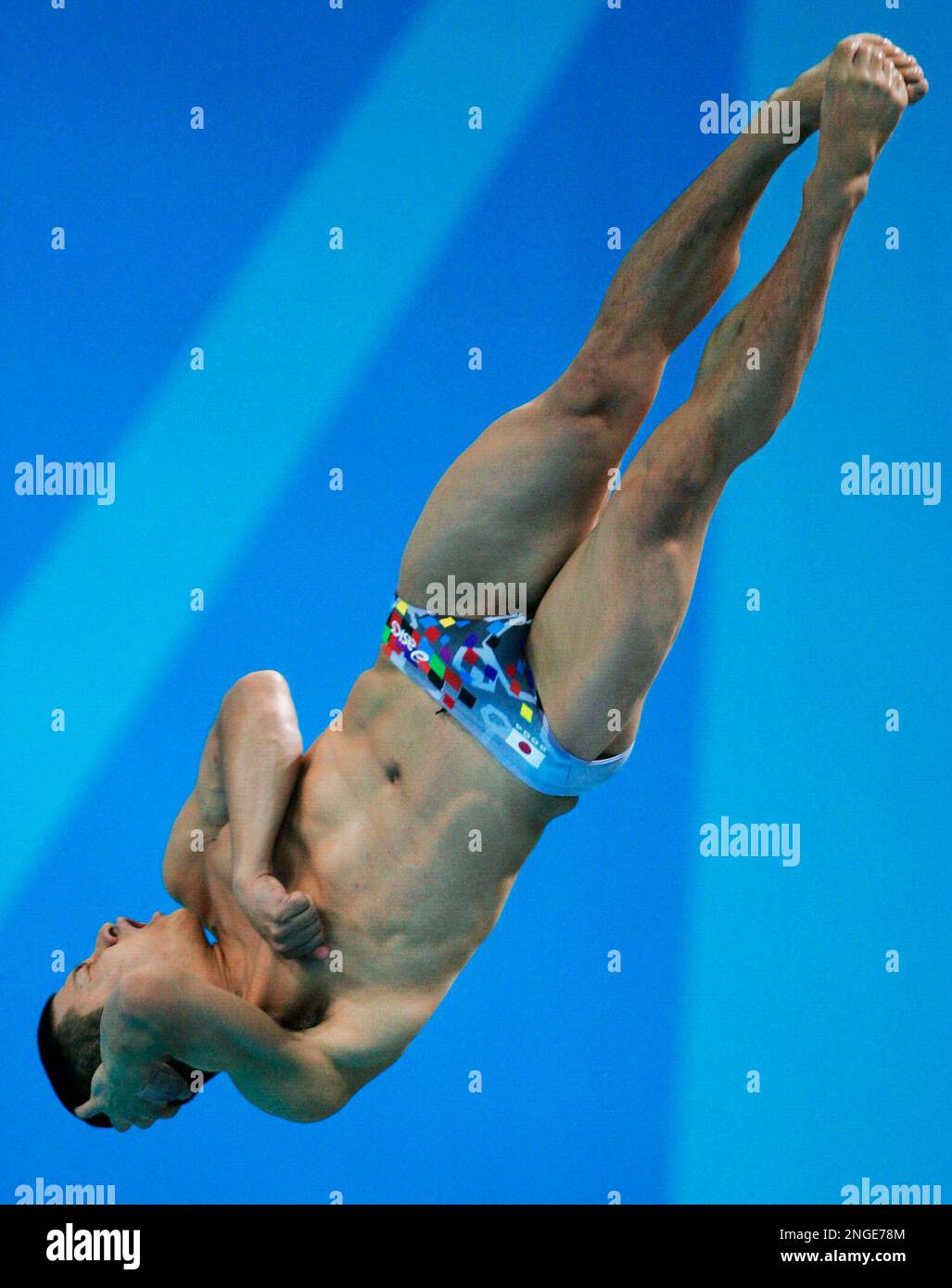 Japan's Ken Terauchi competes in the preliminaries of the Men's 3 meter ...