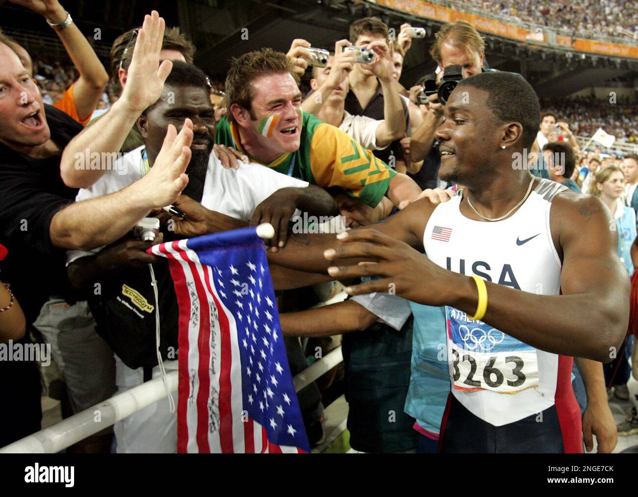 Justin Gatlin, of the United States, celebrates with the crowd after ...