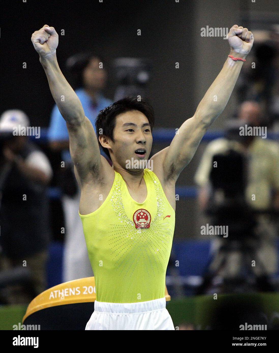 China's Teng Haibin celebrates his gold medal in the pommel horse ...