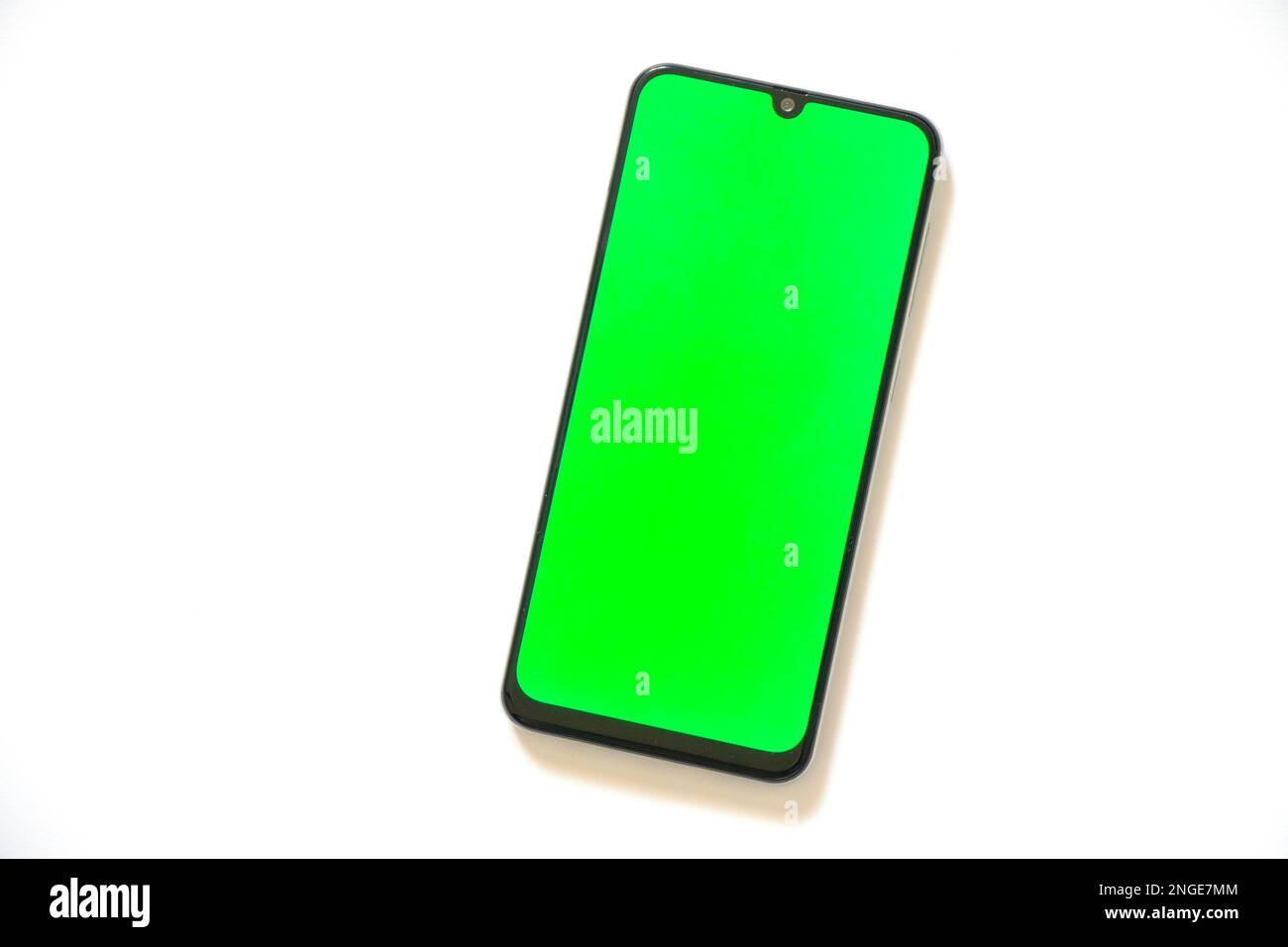 touchscreen phone with a green screen on a light background Stock Photo ...