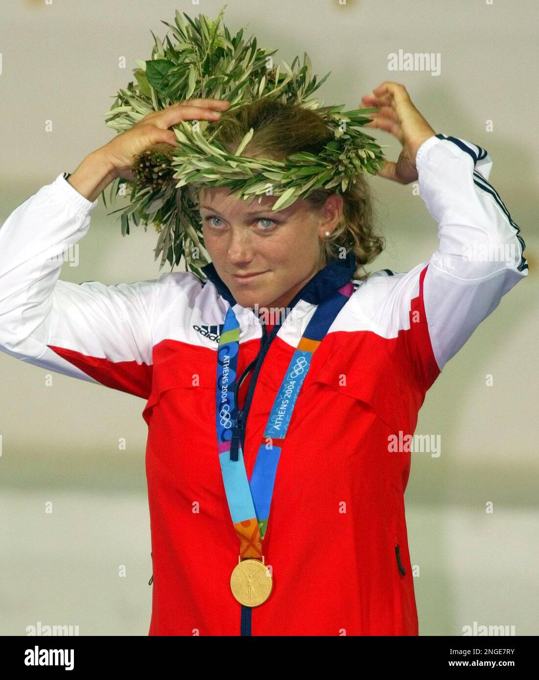 Norway's Siren Sundby adjusts her hair during the medal giving ceremony ...
