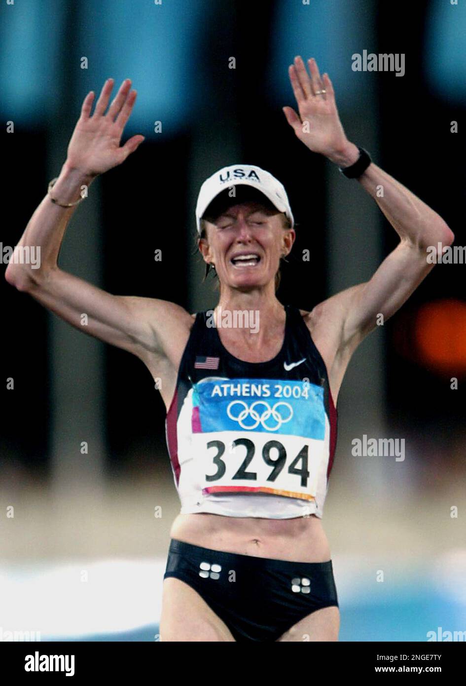 United States' Deena Kastor reacts after finishing third the women's ...
