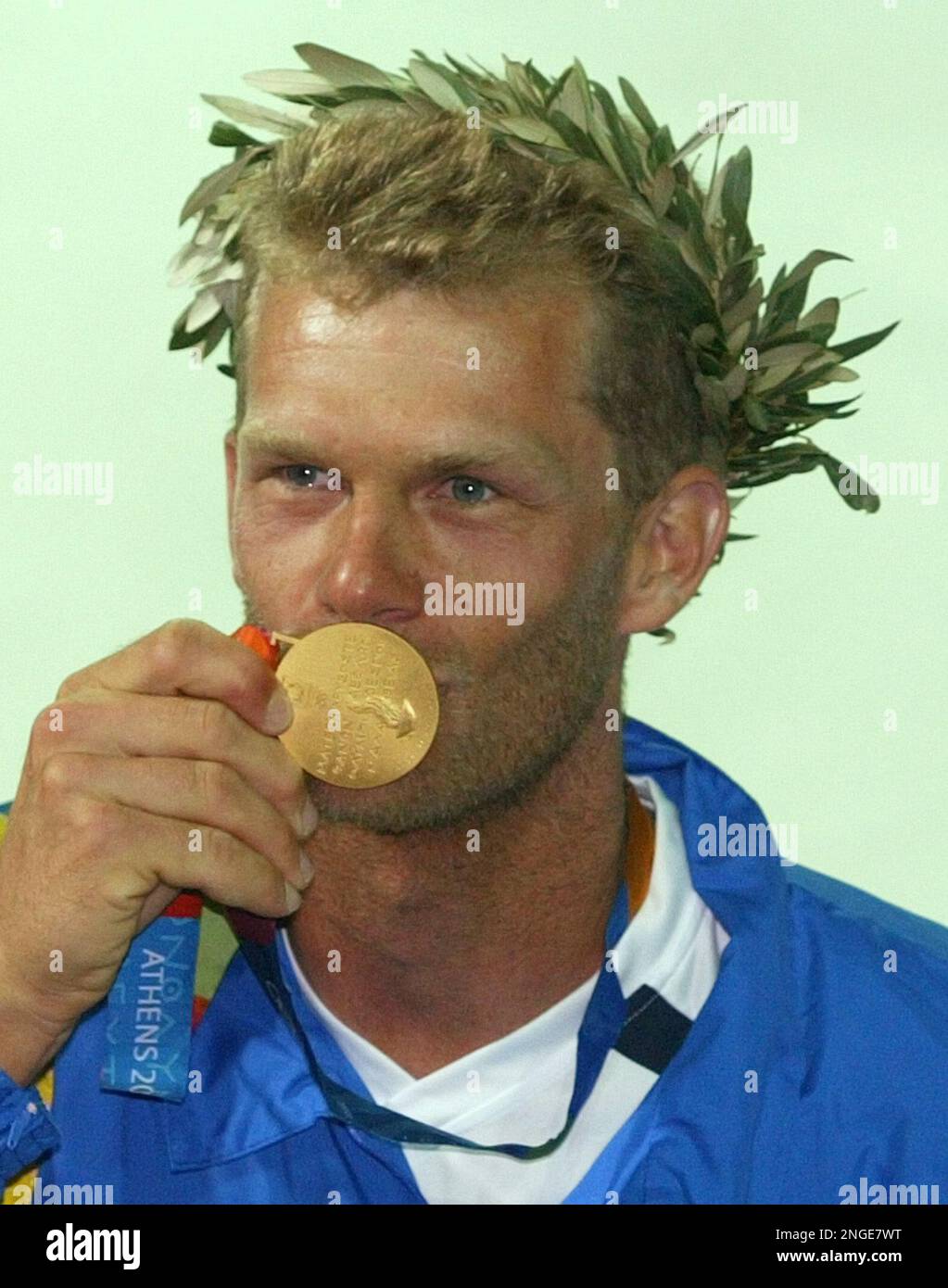 Brazil's Robert Scheidt kisses his gold medal after winning the men's ...
