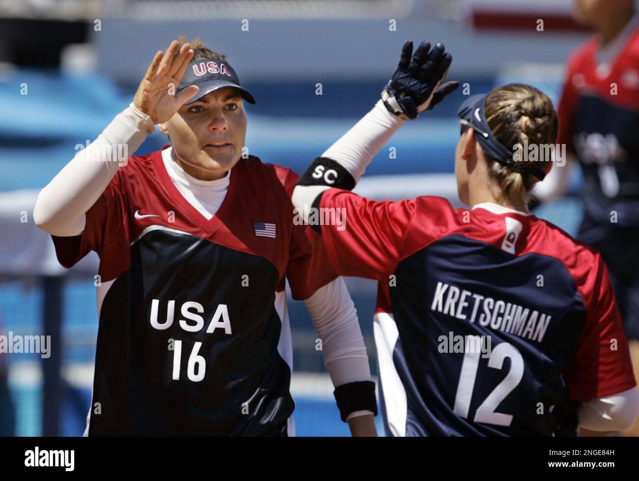 United States pitcher Lisa Fernandez (16) congratulates teammate Kelly ... United States pitcher Lisa Fernandez (16) congratulates teammate Kelly ...