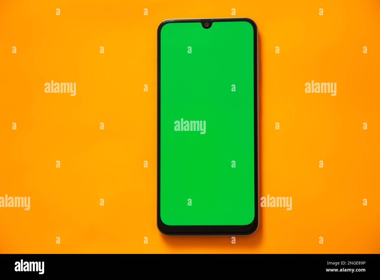 touchscreen phone with a green screen on a light background Stock Photo ...