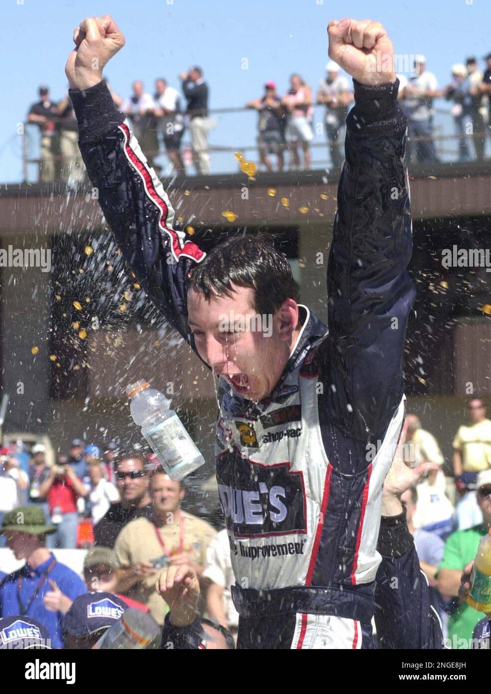 Crew members douse Nascar Busch series driver Kyle Busch of Las Vegas ...