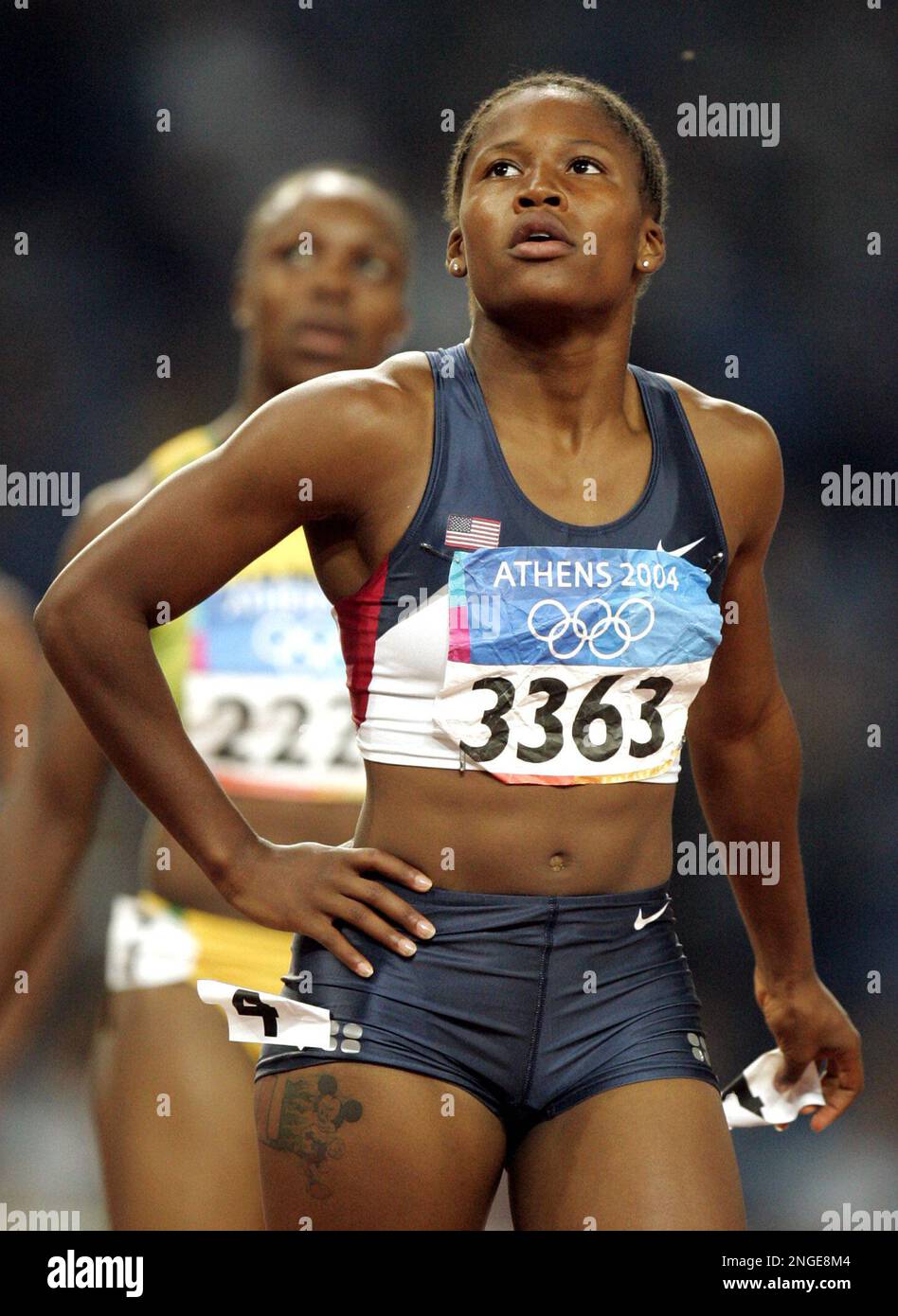 Lauryn Williams, of the United States, reacts after finishing second in ...