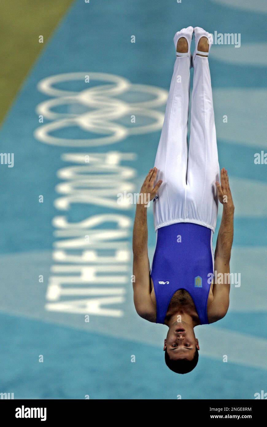 Yuri Nikitin of the Ukraine competes during the men's trampoline ...
