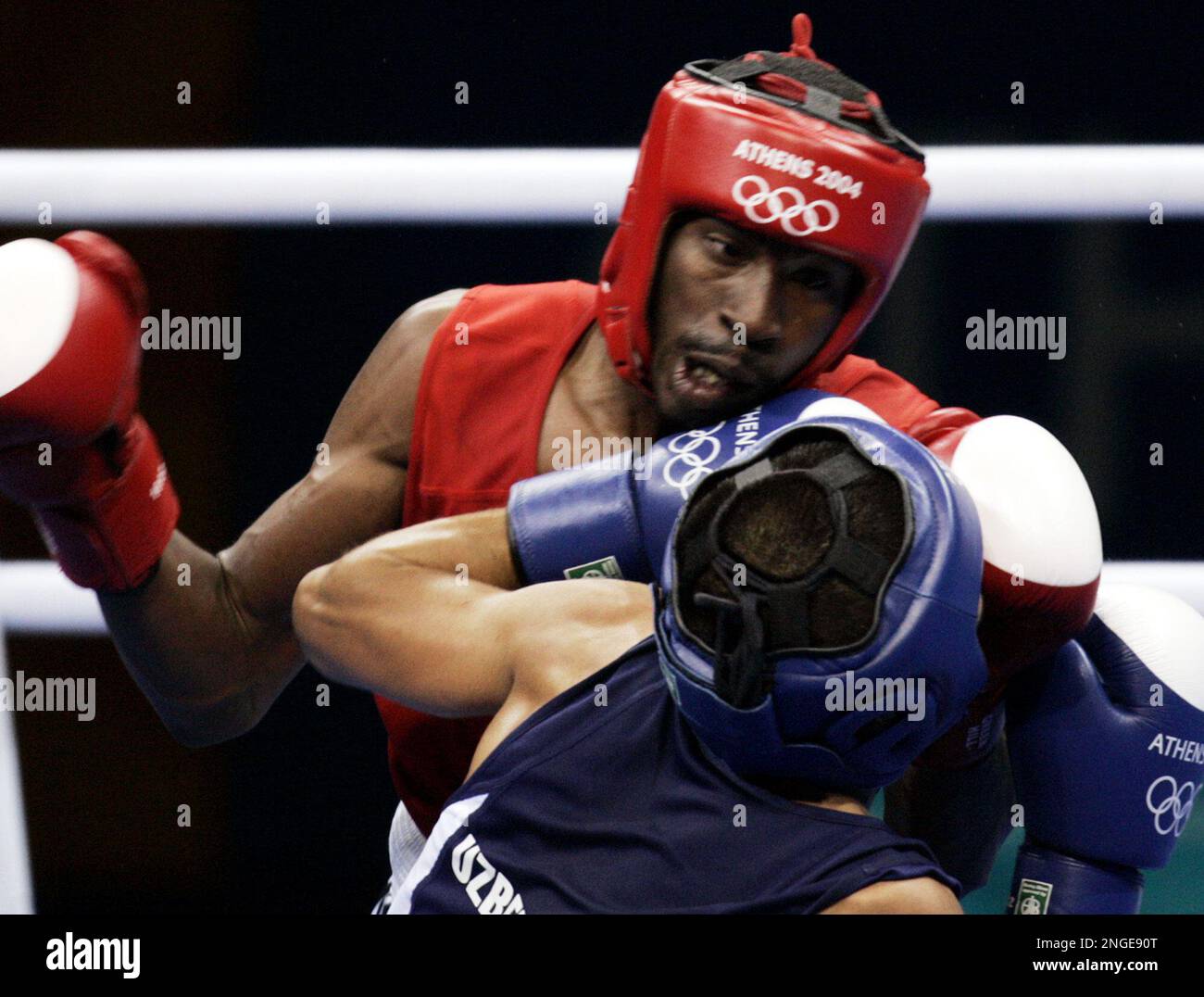 American Ron Siler, right, from Cincinnati, Ohio, throws a punch to ...