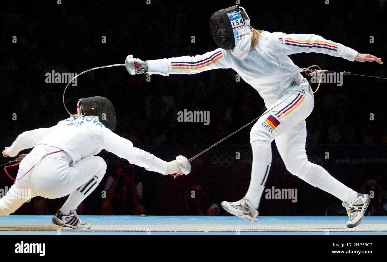 Germany's fencer Britta Heidemann, right, during the gold medal bout of ...