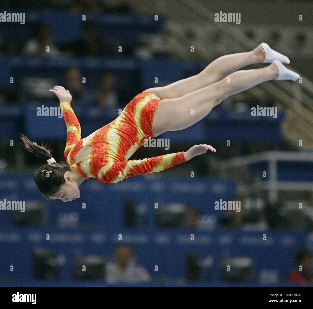 China's Huang Shanshan performs her routine during women's trampoline ...