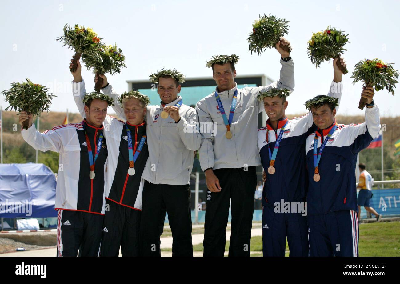 From left to right, Germany's silver medalists Marcus Becker, and ...