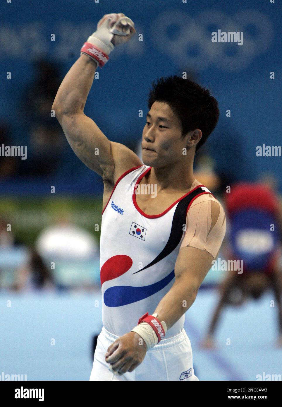 Korea's Kim Dae Eun reacts after competing on the high bar during the ...
