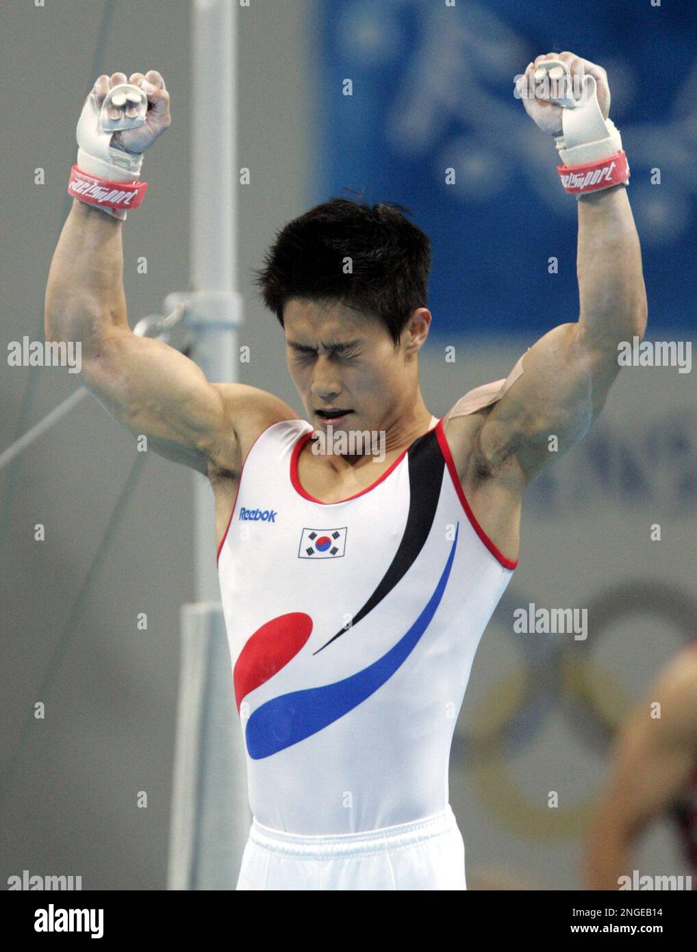 Kim Dae Eun of Korea reacts after competing in the high bar during the ...