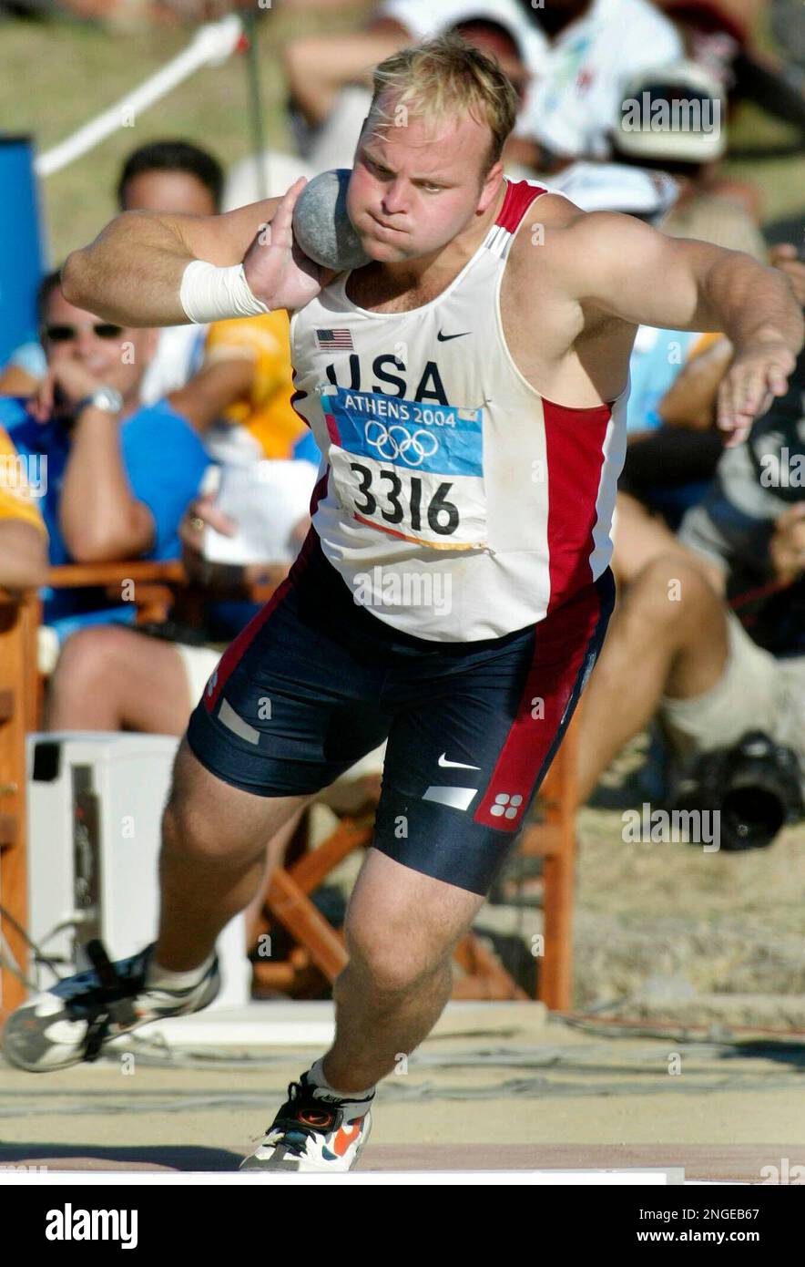 American shot putter Adam Nelson competes in the 2004 Athens Olympic ...