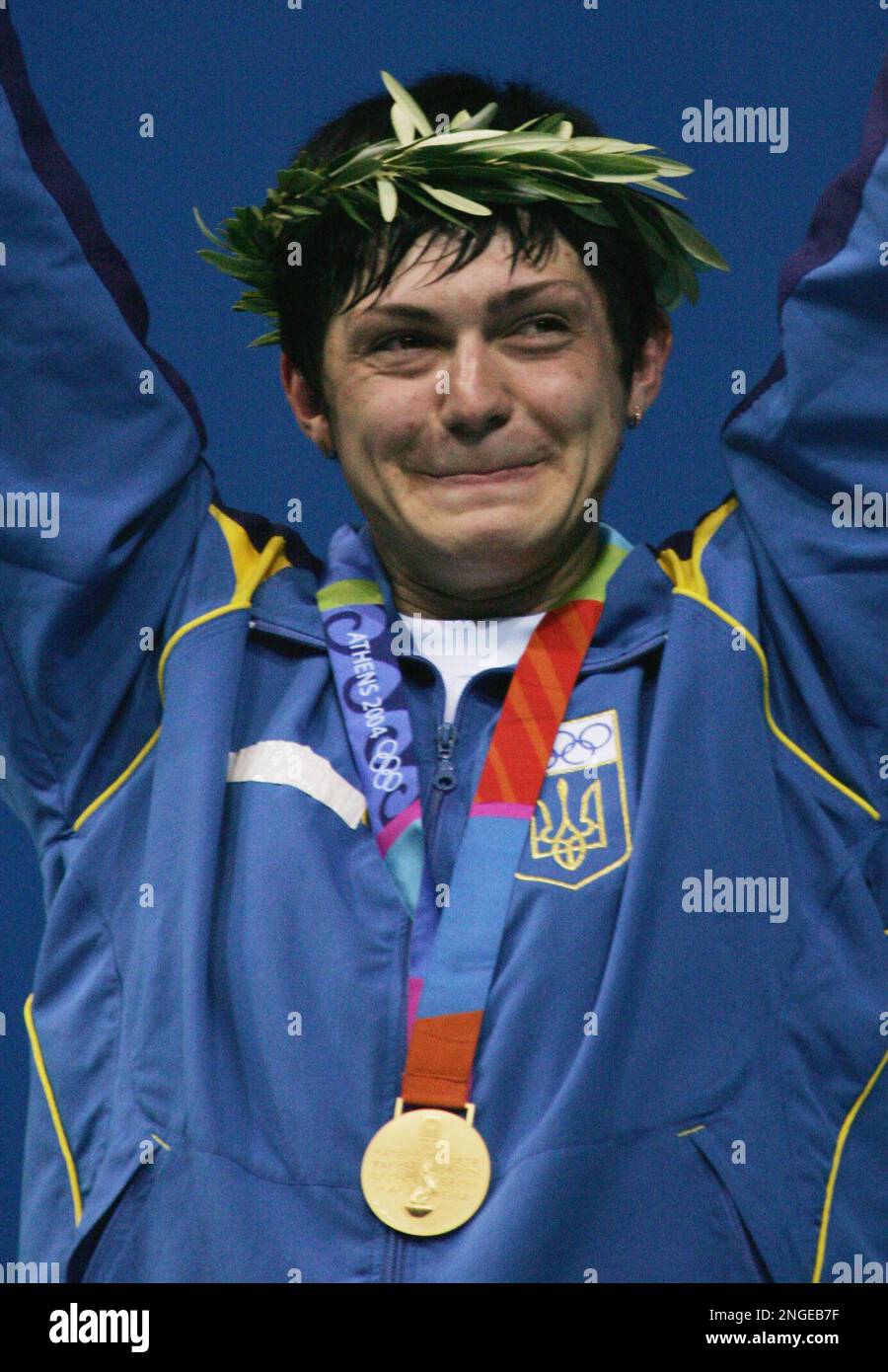 Ukraine weightlifter Nataliya Skakun smiles after winning the gold ...