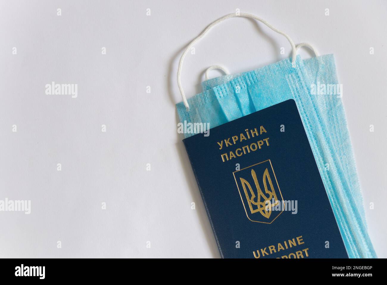 medical mask lies in the Ukrainian foreign passport Stock Photo - Alamy