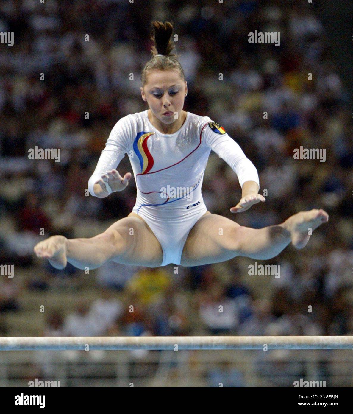 Romania's Nicoleta Daniel Sofronie competes on the uneven bars during ...