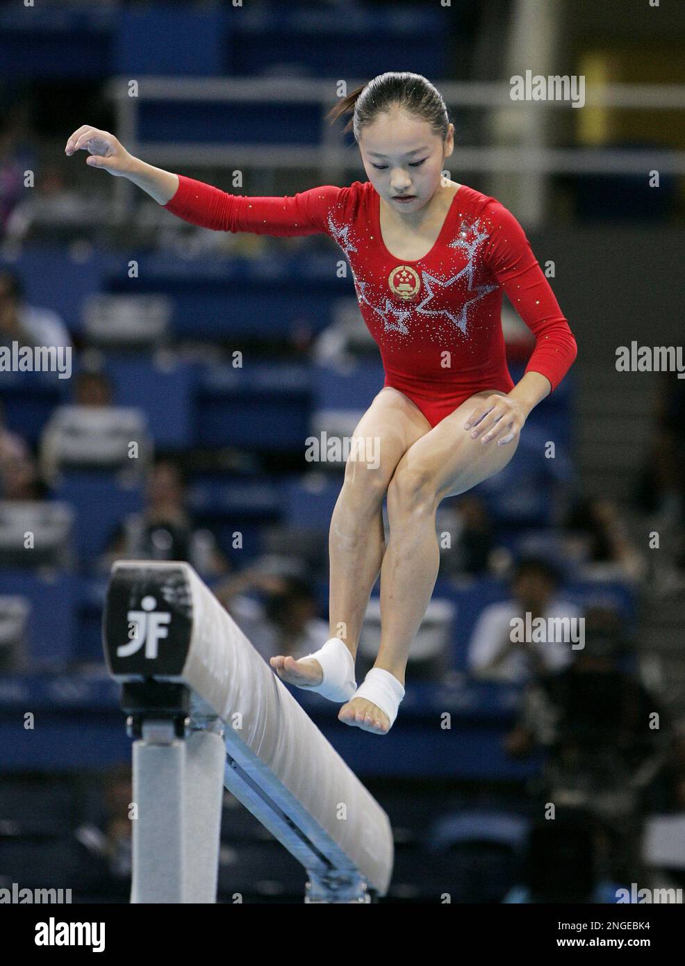 China's Li Ya falls from the balance beam during women's gymnastics ...