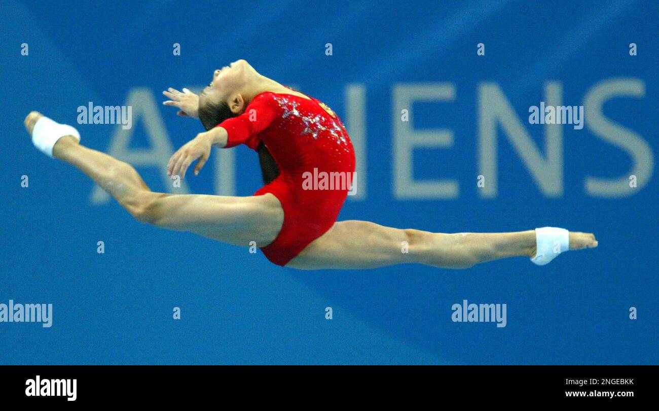 Li Ya of China competes in the balance beam during the women's ...