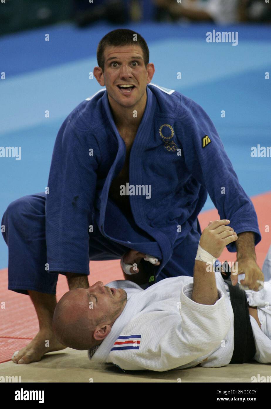 James Pedro, of the United States, up, reacts after defeating France's ...