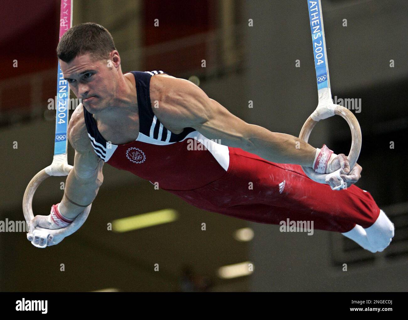 Blaine Wilson of the United States competes in the rings during the men ...