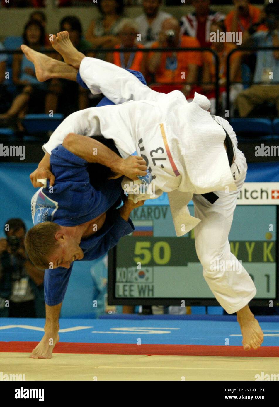 Vitaly Makarov, from Russia, left, and Lee Won Hee, from Korea, fight ...