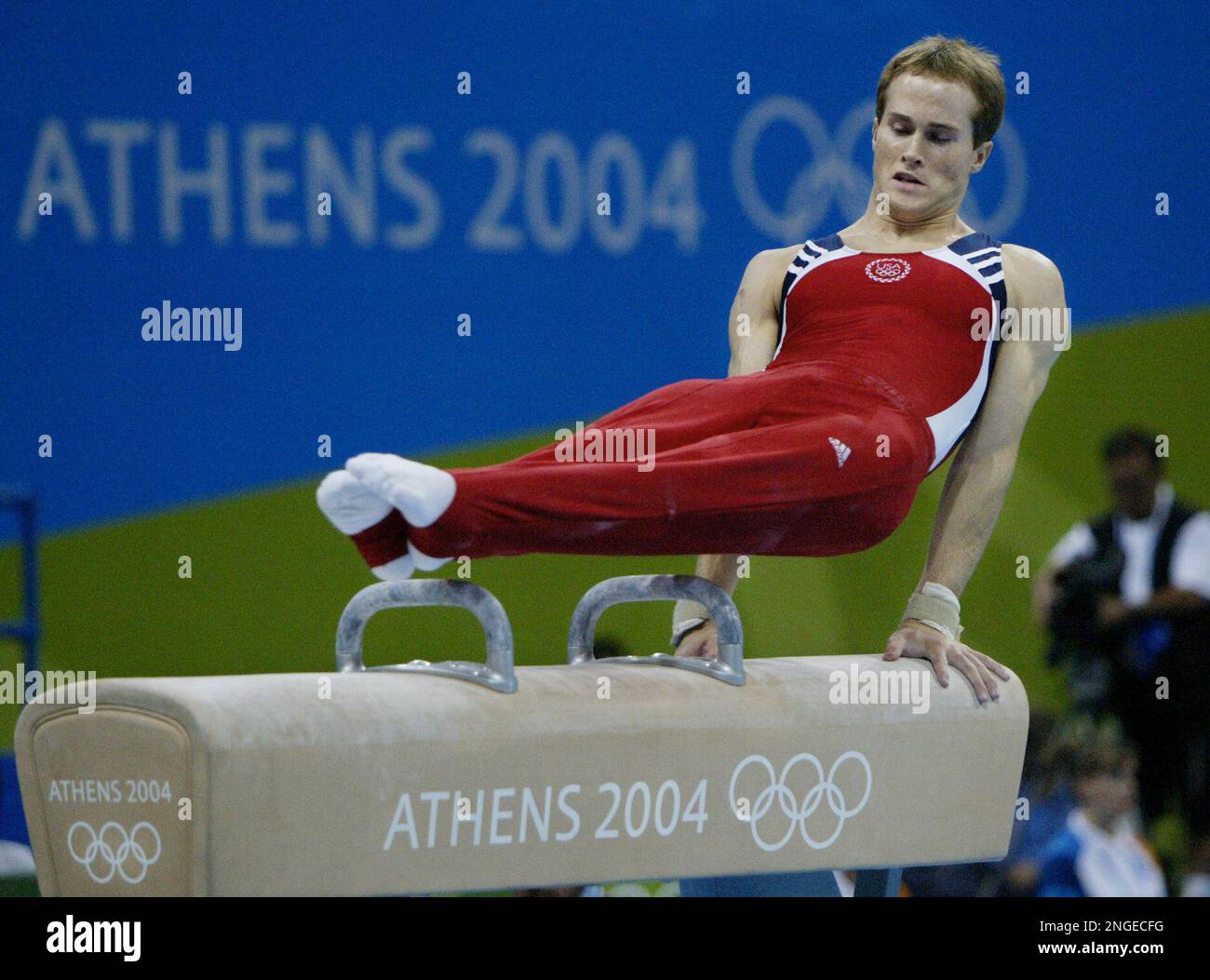 Paul Hamm of the United States performs his pommel horse routine during ...