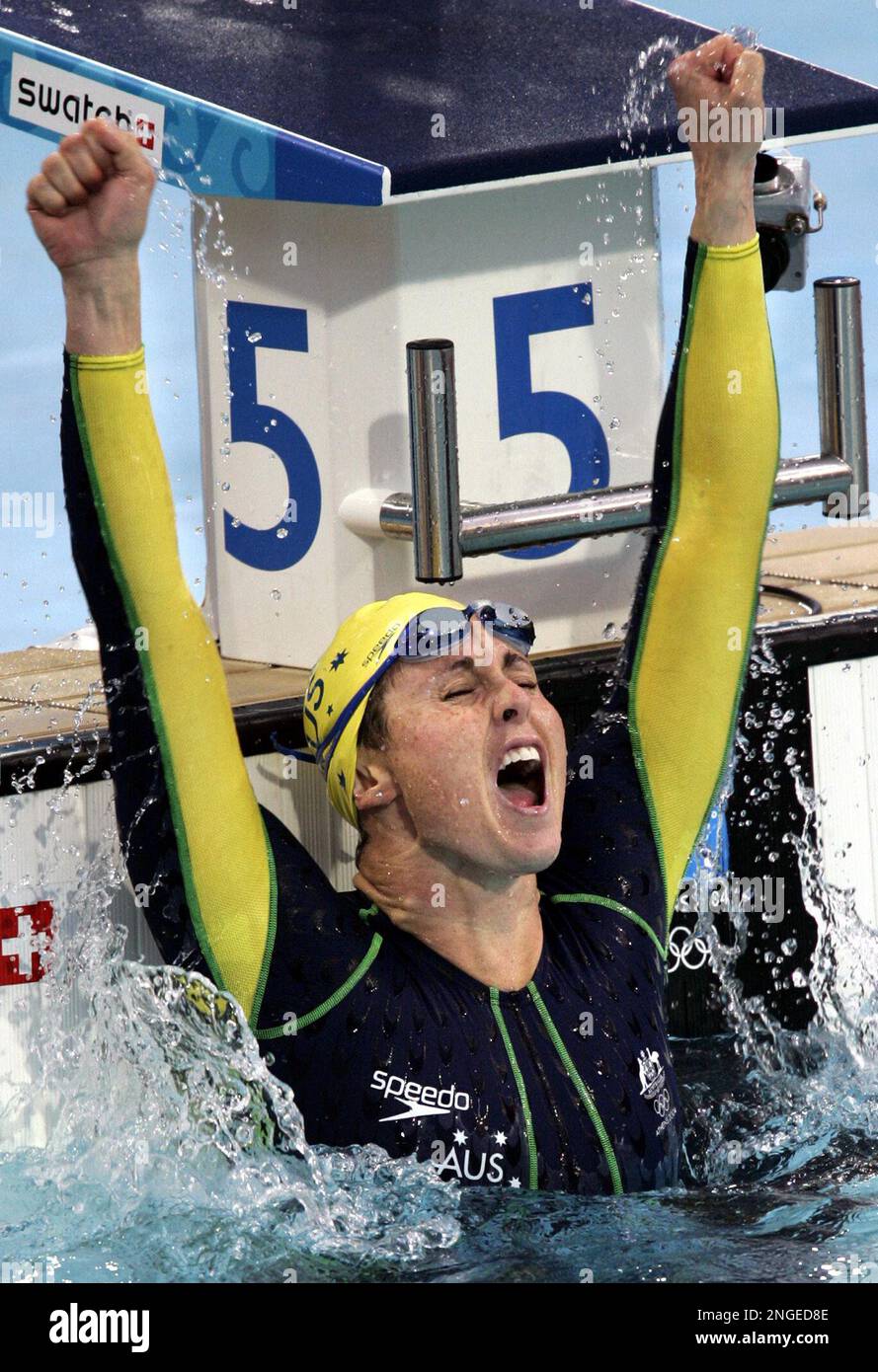 Petria Thomas, of Australia, celebrates after winning a gold medal in ...
