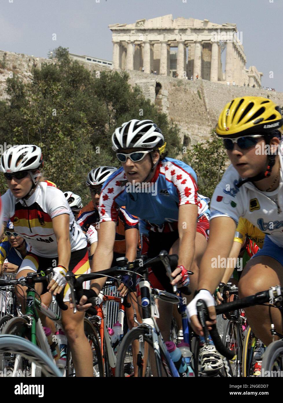 Canada's Susan Palmer Komar, center, climbs the hill under the ...