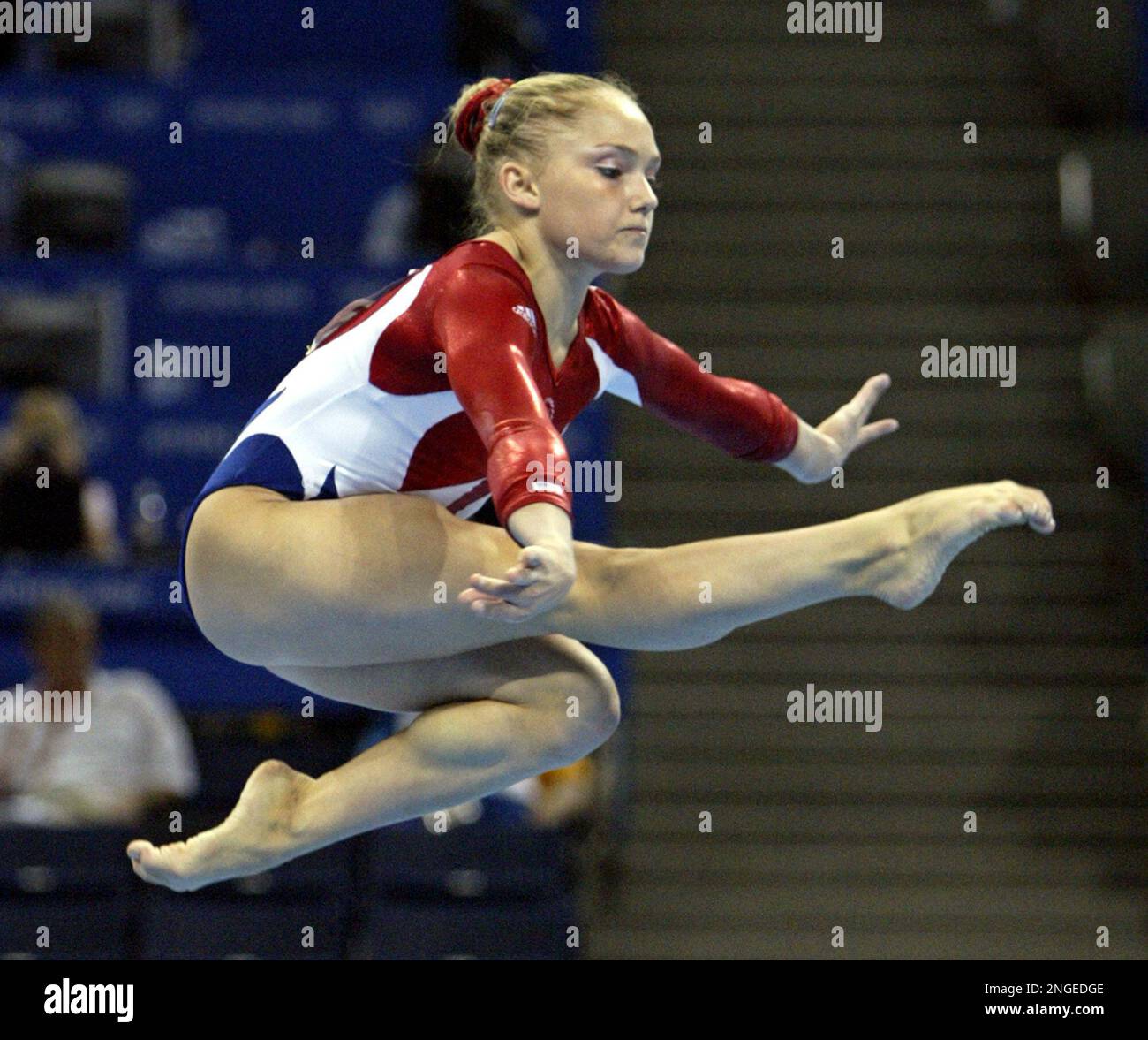Courtney McCool of the United States competes in the floor exercise ...