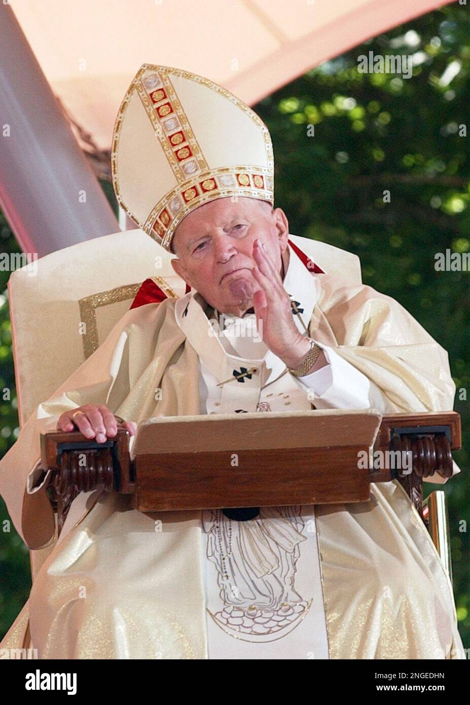 Pope John Paul II gestures during an open-air mass in Lourdes, Sunday ...